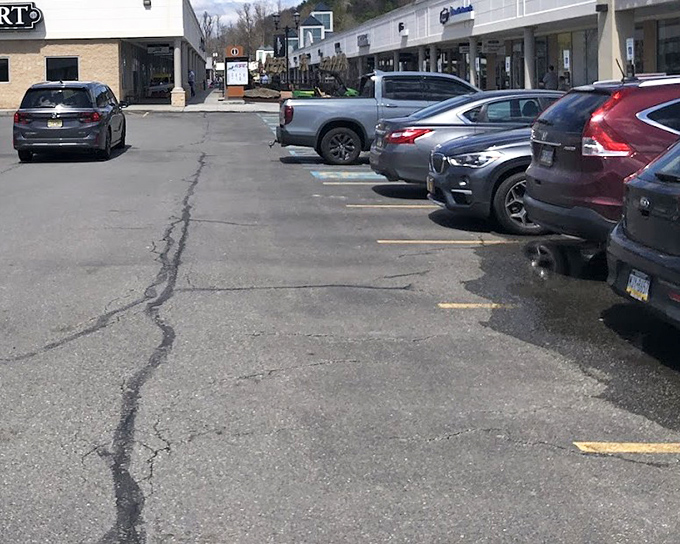 The outdoor shopping layout means fresh Pocono air between bargains. Nature and commerce coexist in this retail village design.