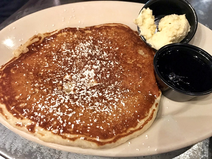 Pancakes that could double as pillows, if pillows were delicious and covered in syrup.