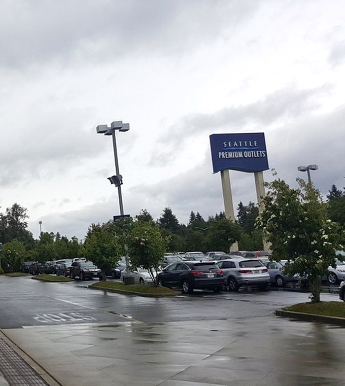 Even on overcast days (a Washington specialty), the parking lot fills with deal-hunters armed with empty trunks and optimistic credit limits.