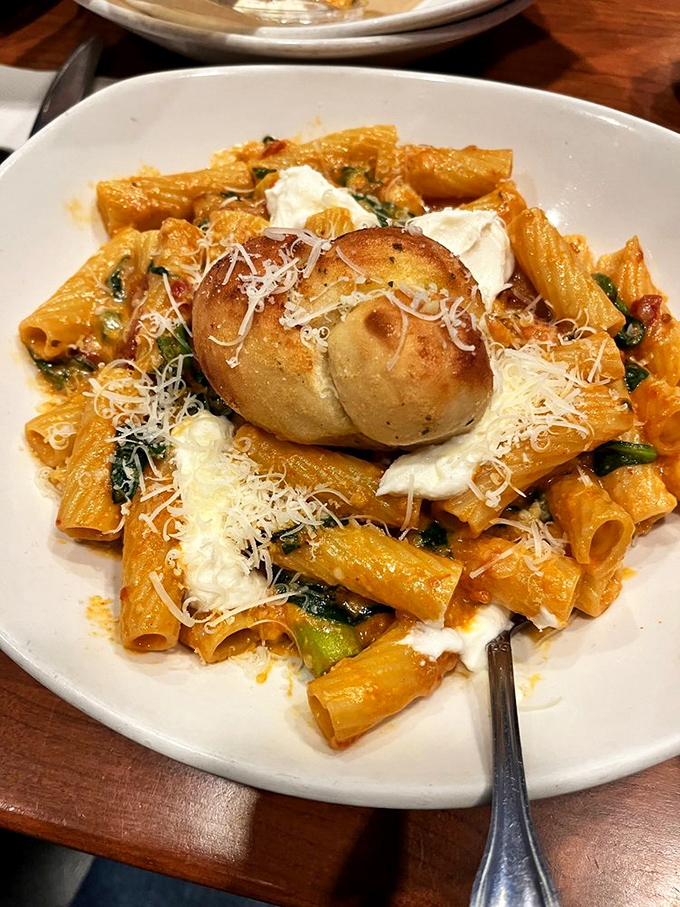 Pasta that proves Stax isn't just a breakfast one-hit wonder. That garlic bread perched atop like a carb crown deserves its own fan club.