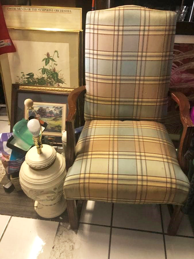 This plaid armchair whispers "distinguished professor's study" while secretly being the most comfortable spot for Sunday afternoon naps.