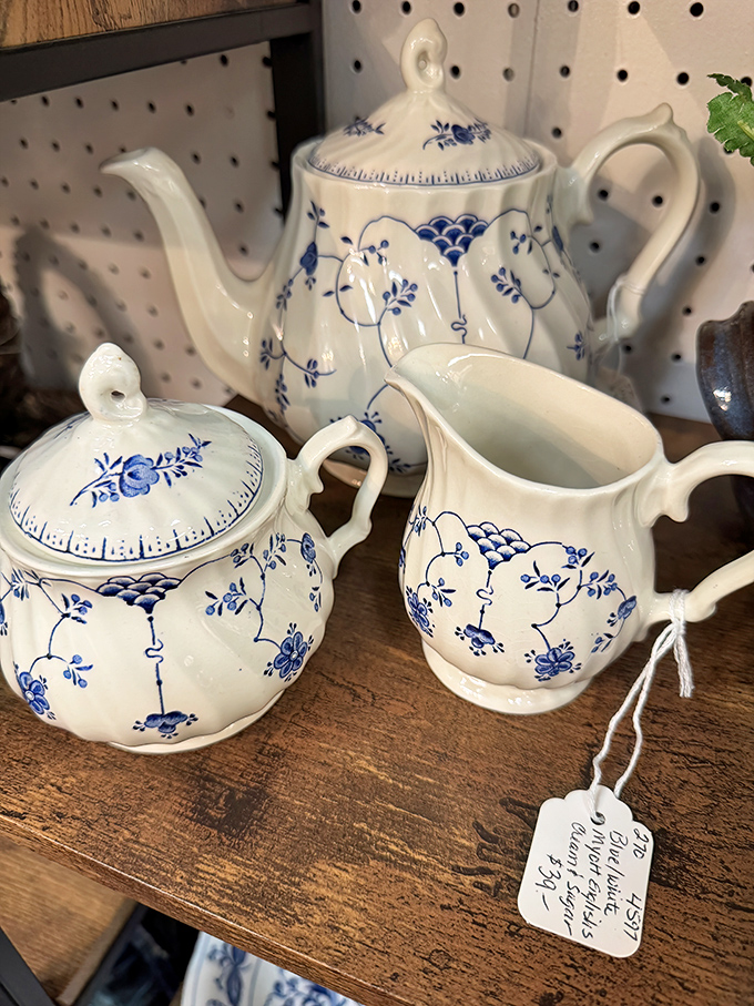 This delicate blue and white tea set isn't just porcelain; it's Sunday afternoons at Grandma's house, complete with stories and too many cookies.