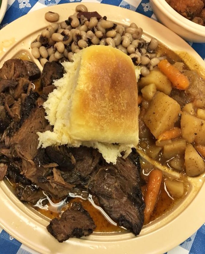 This pot roast with vegetables and cornbread isn't just dinner &ndash; it's a warm hug on a plate after a long day.