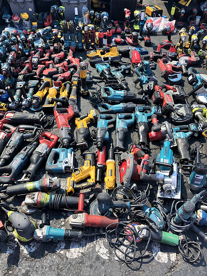 Tool paradise for DIY dreamers. Like a hardware store had a yard sale, these power tools await their second act in someone's garage.