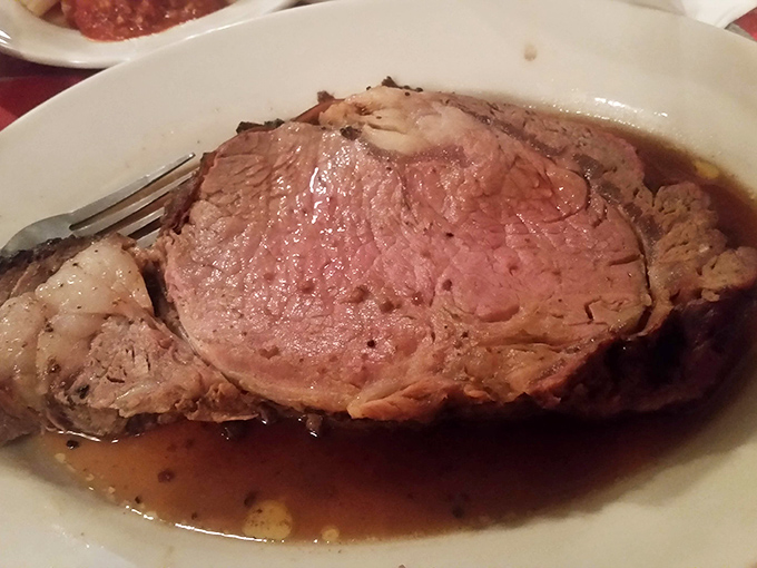 Prime rib so tender you barely need a knife, swimming in its own savory juices—this is what carnivore dreams are made of.