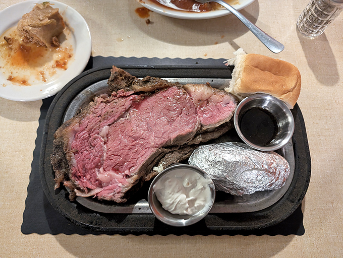 Behold the crown jewel: perfectly pink prime rib with a crusty exterior, served with horseradish cream that'll clear your sinuses delightfully.