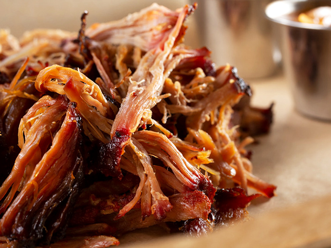 Pulled pork so tender it looks like it's been combed rather than pulled. The kind of barbecue that makes vegetarians question their life choices.