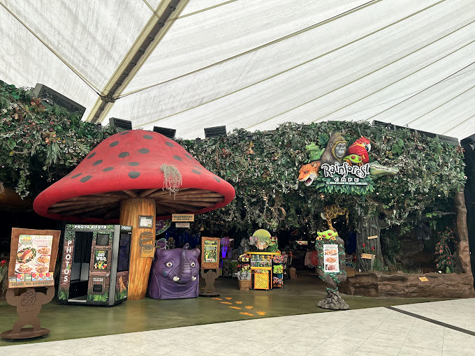 The whimsical entrance to Rainforest Cafe brings unexpected jungle vibes to this shopping mecca, complete with a giant mushroom that Alice would approve of.