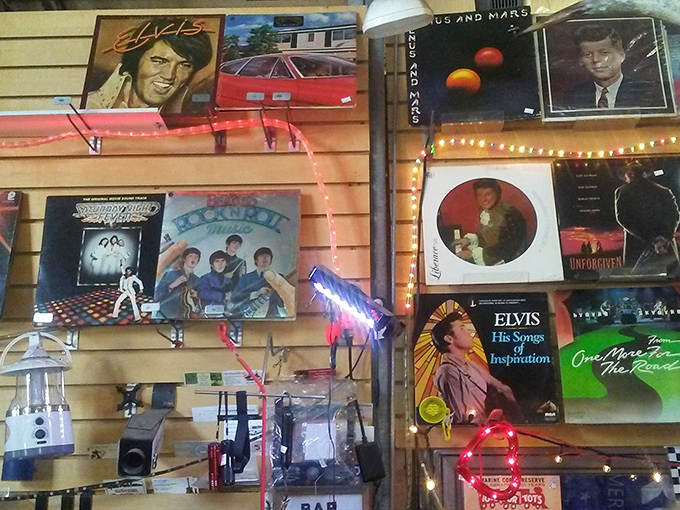The wall of vinyl records and memorabilia serves as a time capsule of American pop culture&mdash;Elvis hasn't left this building.
