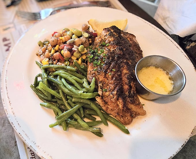 This isn't just fish; it's a seafood masterpiece with sides that refuse to be upstaged. Green beans never had it so good.