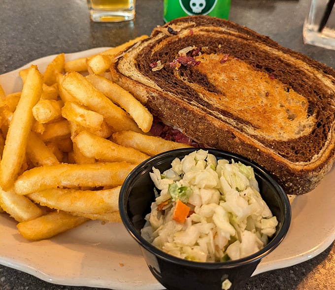This isn't just a sandwich&mdash;it's architecture with flavor. Crispy bread, tangy sauerkraut, and enough meat to make a vegetarian weep.