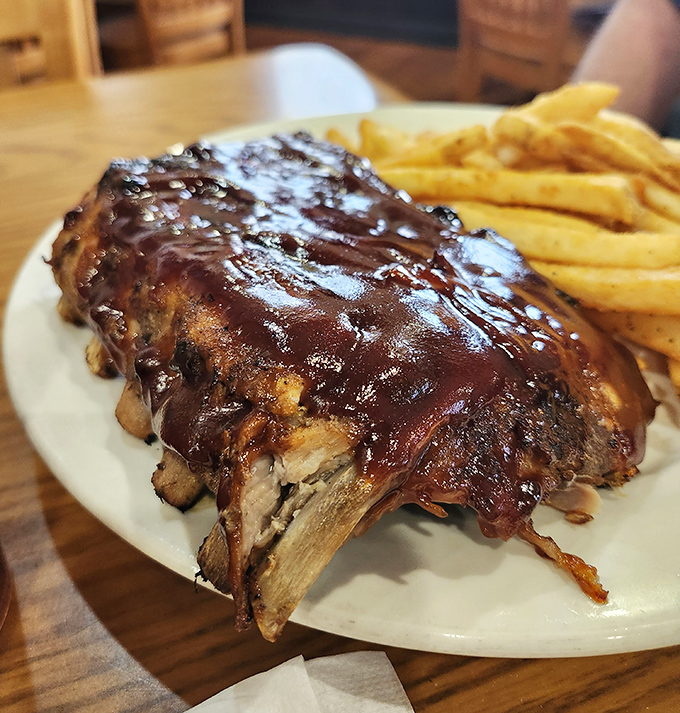 Fall-off-the-bone ribs slathered in tangy BBQ sauce&mdash;the kind that require both napkins and a temporary suspension of table manners. 