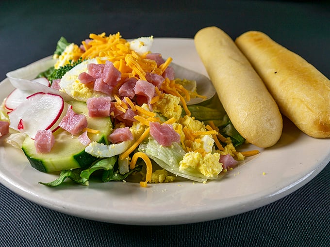 The chef's salad and breadsticks&mdash;what my doctor thinks I should be eating versus what I'm actually using to save room for more steak.
