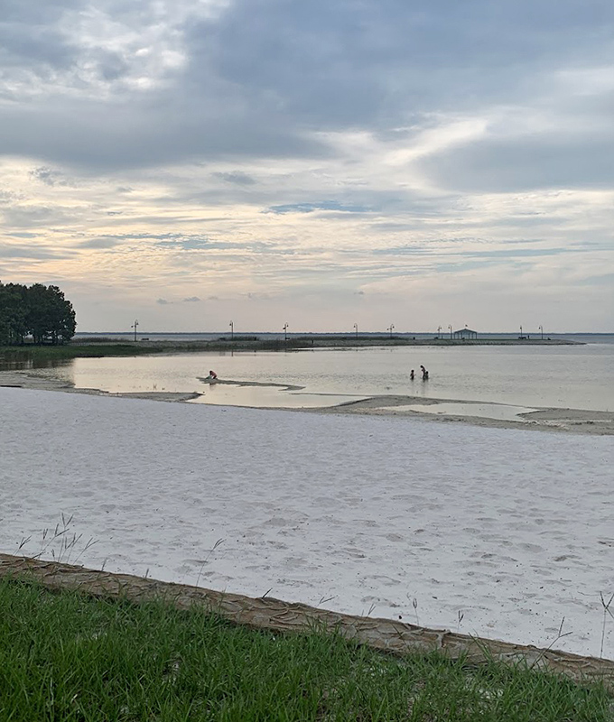 Nature's own infinity pool stretches toward the horizon. This peaceful shoreline proves Florida's best beaches aren't always found at the coast.