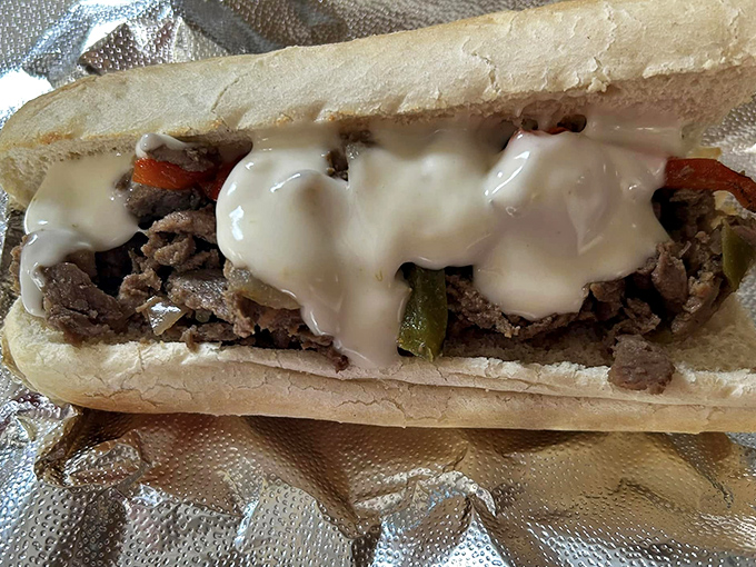 A proper Philly sandwich doesn't need fancy presentation&mdash;just meat, melted cheese, and the promise of needing extra napkins. Delicious simplicity.