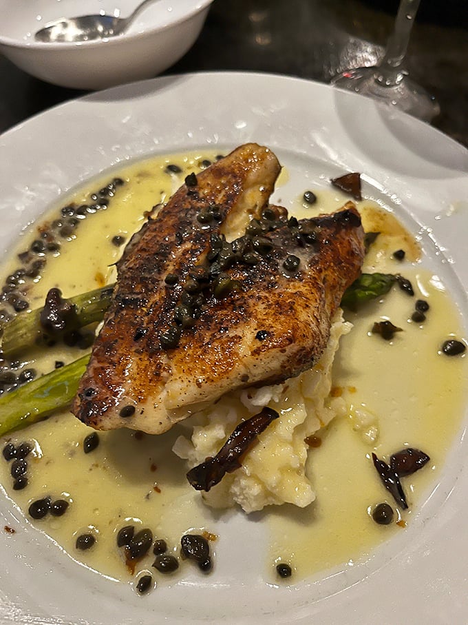 This isn't just fish&mdash;it's a perfectly seared sea bass floating in a sea of butter and capers that would make Neptune himself request seconds.