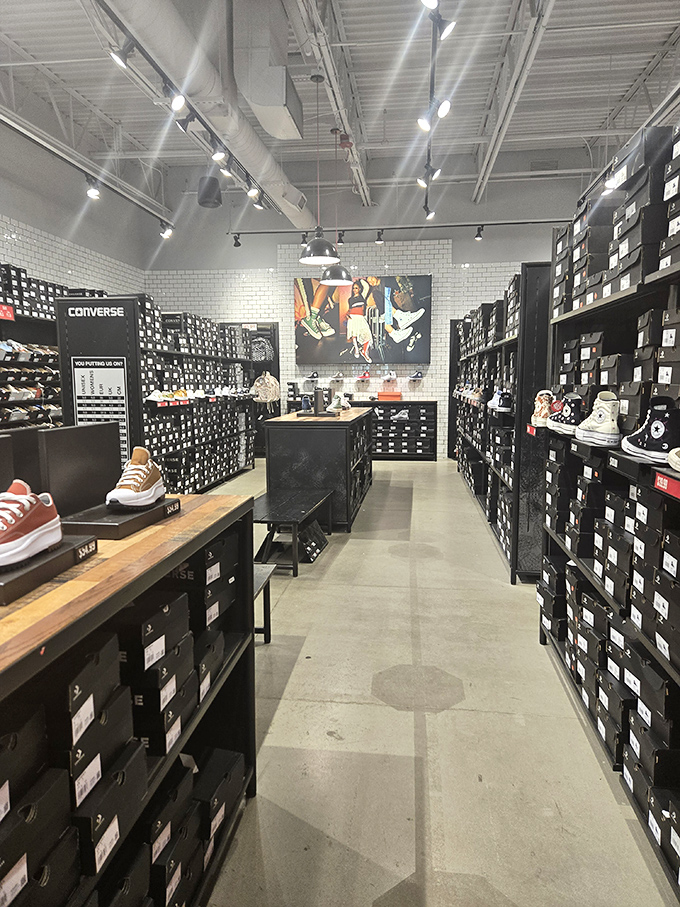 The Converse store isn't selling shoes&mdash;it's selling nostalgia with modern upgrades. That wall of Chuck Taylors is like a timeline of American casual fashion.