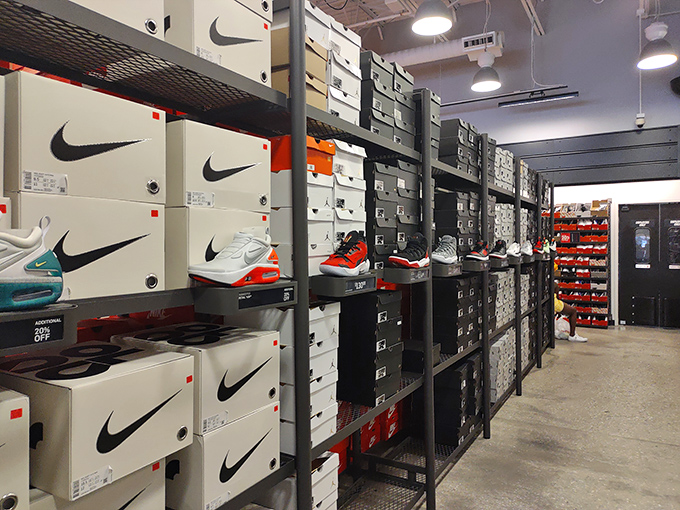 The Nike outlet's wall of shoe boxes resembles a retail Tetris game, each container holding potential athletic greatness&mdash;or at least the appearance thereof.