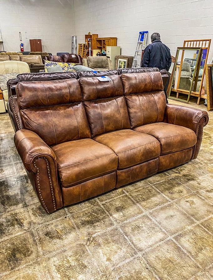 Leather that looks like it's been broken in by a cowboy philosopher. This sofa is ready to cradle you through Netflix marathons.