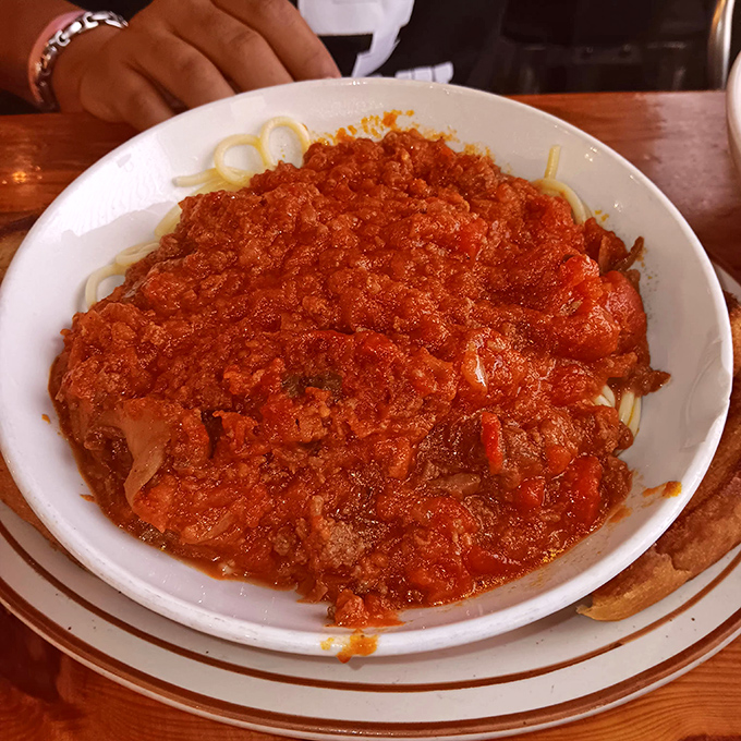 Spaghetti with meat sauce that would make any Italian grandmother nod in approval &ndash; proof that Country Omelet knows comfort food extends beyond breakfast. 