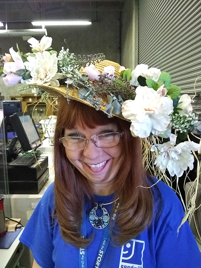 A creative thrifter's masterpiece! This floral hat transformation showcases the magical possibilities hiding in those blue bins &ndash; from castoff to catwalk-worthy in minutes.