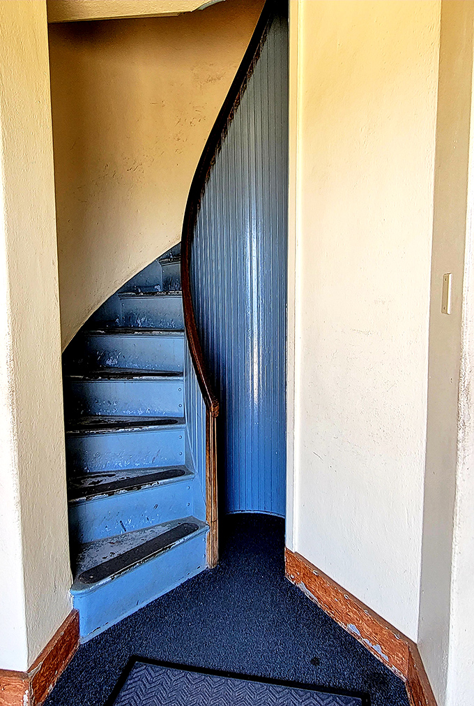 These well-worn blue stairs have carried lighthouse keepers, park rangers, and curious visitors upward for generations&mdash;each step a journey through time.