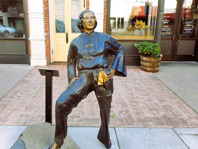 This bronze figure stands as a cultural touchstone in downtown Pendleton, silently observing the ebb and flow of modern life.