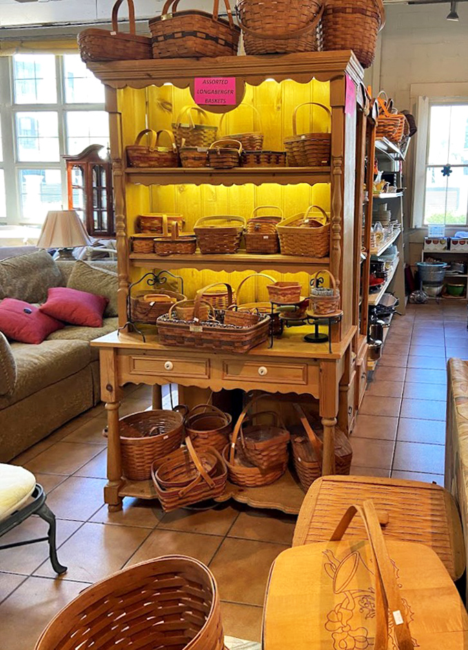 Basket heaven! Like a museum exhibit titled "The Complete History of Picnic Containers from 1950-2010," illuminated for dramatic effect.