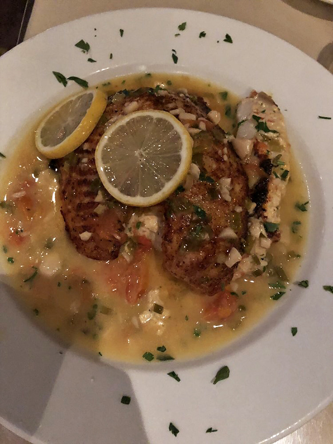 Delicate fish bathed in a buttery lemon sauce that makes you wonder why anyone would ever eat fish any other way.