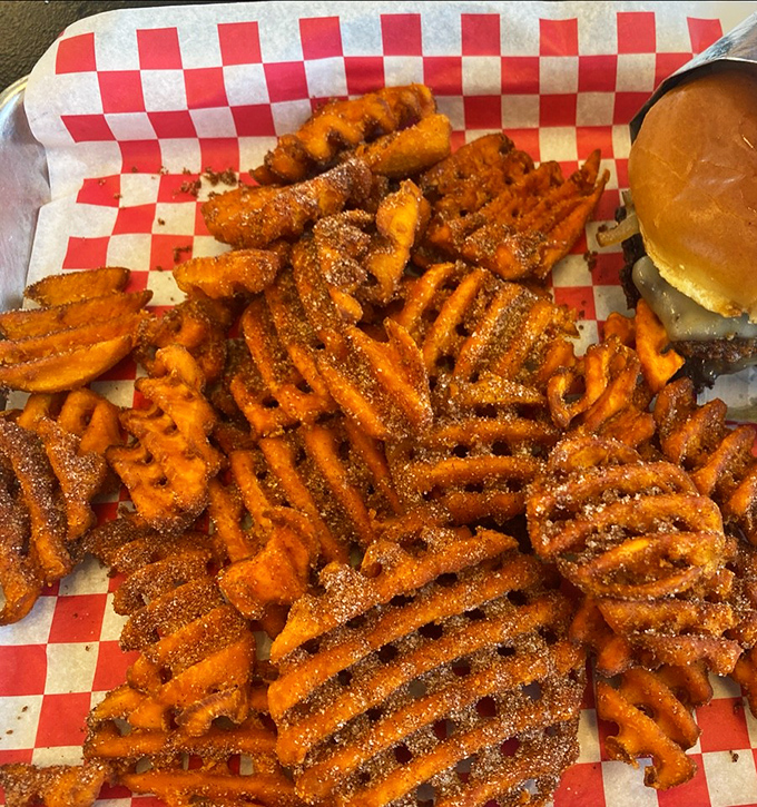 Sweet potato waffle fries that deserve their own fan club. Crispy, seasoned, and impossible to stop eating—they're the supporting actor who steals the show.