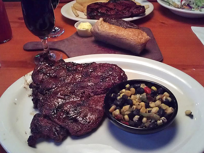 A T-bone this perfectly charred deserves its own standing ovation, complete with a loaded baked potato for an encore.