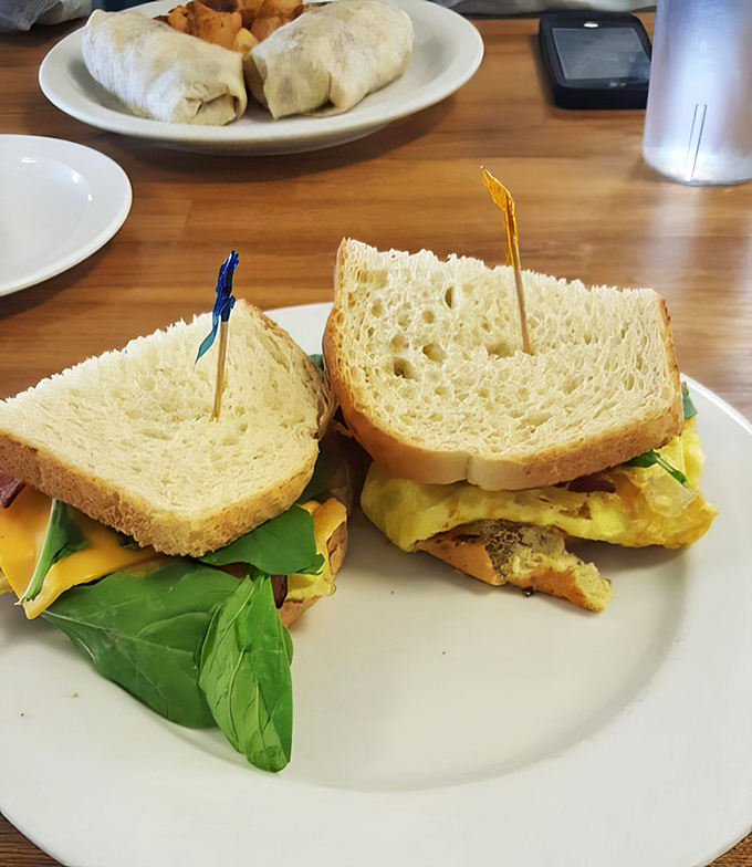 Breakfast sandwiches: where bread meets egg in holy matrimony, with bacon serving as best man and cheese officiating the whole delicious ceremony.