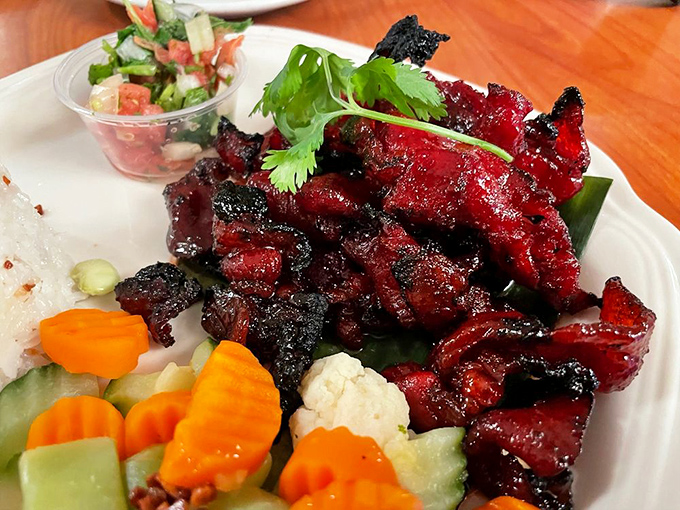 Tocino that glows with that signature red hue, like a beacon of porky perfection. Those vegetables on the side? Just there to ease your conscience.