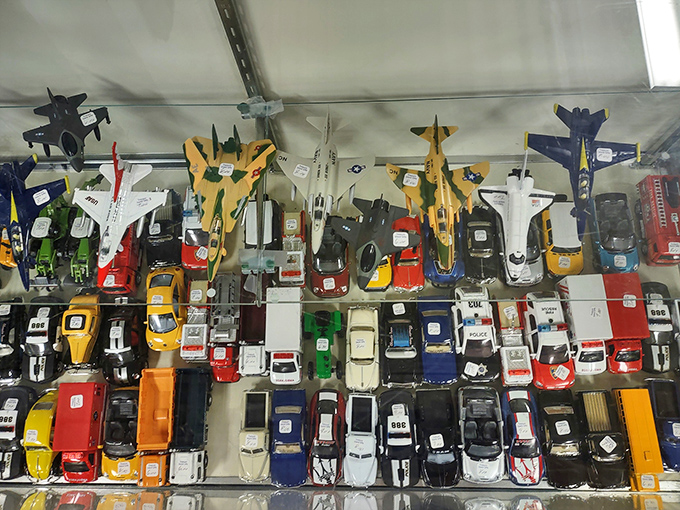 Miniature vehicles and aircraft lined up with military precision. Childhood nostalgia by the dozen, waiting to join new collections or start second playtime careers.