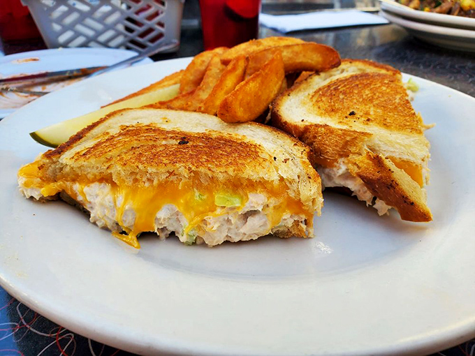 The humble tuna melt&mdash;elevated to art form. That golden-brown exterior gives way to a gooey cheese center that makes Monday feel like Friday.