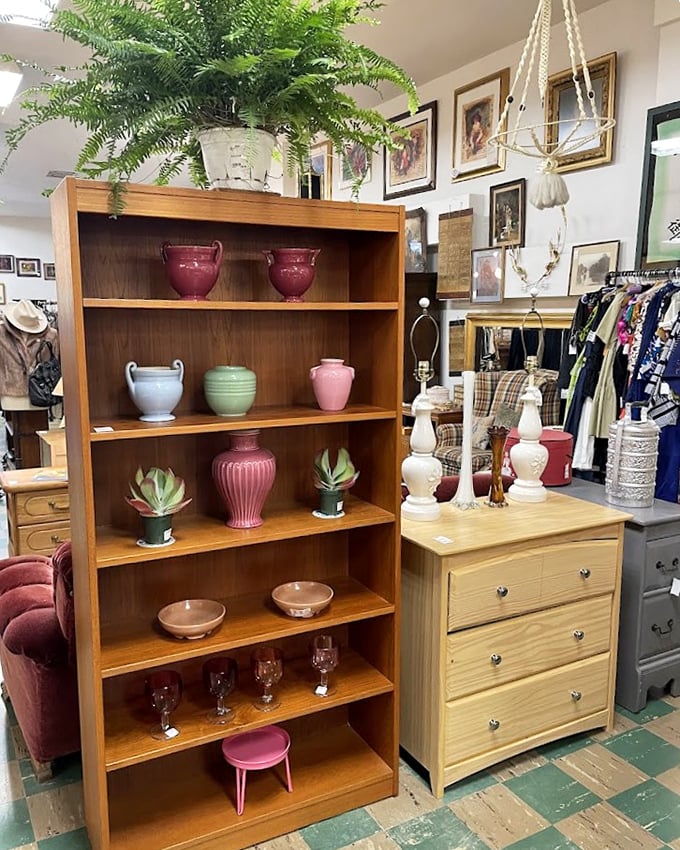 A mid-century bookshelf that's found its second calling as a showcase for ceramics in every shade of pink. Marie Kondo would approve of this joyful display.
