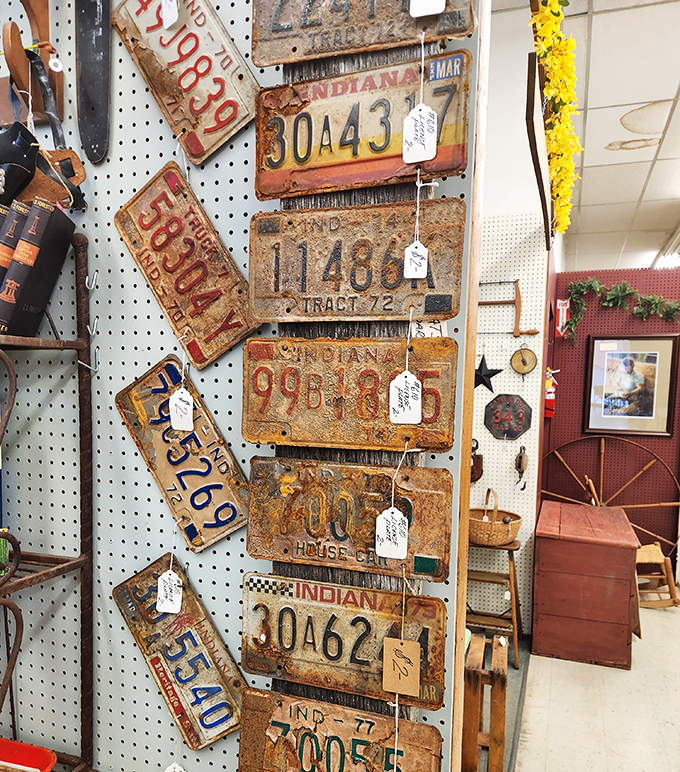 Rusty Indiana license plates tell tales of road trips past – each dent and scratch represents a journey someone once took.