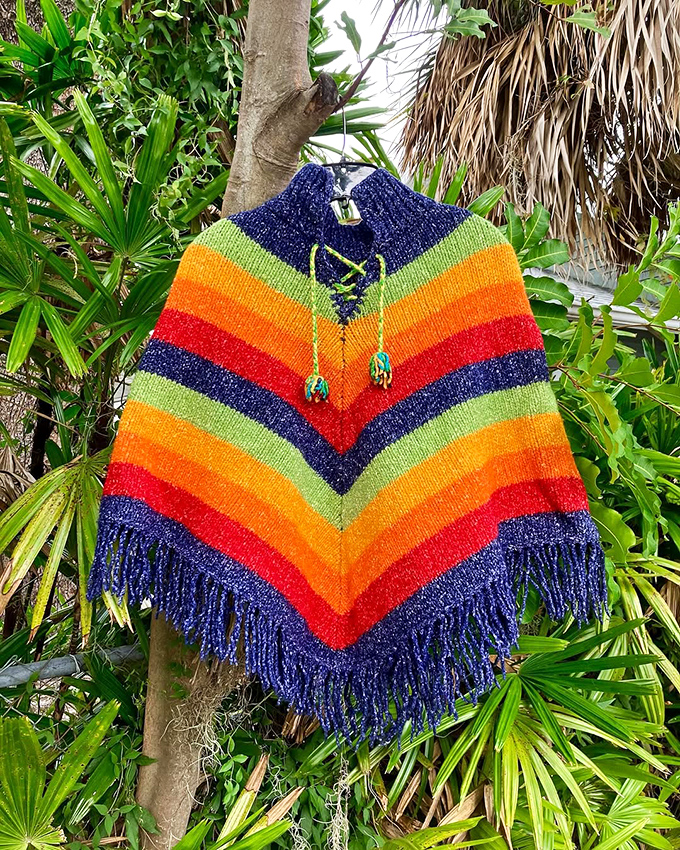 Not just any poncho&mdash;a rainbow time machine to the 1970s. Perfect for those three days of Florida "winter" or your next music festival.