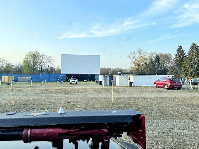 The distinctive blue fencing creates a cocoon around this time capsule of Americana, where memories are made one frame at a time.