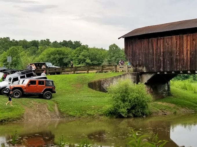 Even modern vehicles seem to pay their respects when visiting this historic landmark. That orange Jeep looks like it's on a pilgrimage.