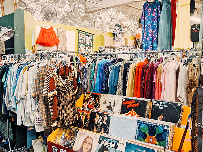 A rainbow of vintage textiles where every hue has a history. Records below, clothing above &ndash; a perfect Portland pairing like coffee and rain.