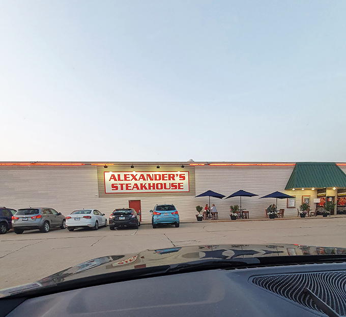 Alexander's Normal location proves great steaks don't need flashy buildings, just skilled grilling.