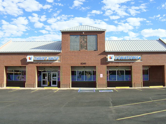 The Animal Humane Thrift Shop's brick facade and glass block windows house a boutique-quality shopping experience with heart.