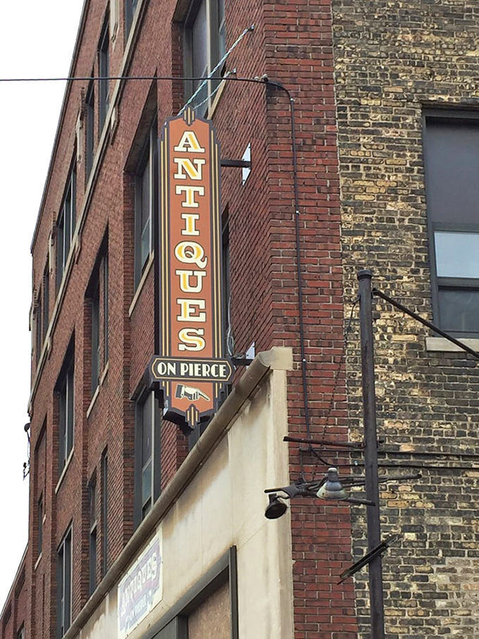 Follow the vertical "ANTIQUES" sign to vintage heaven. This Milwaukee landmark guides treasure hunters to Antiques on Pierce's urban collection.