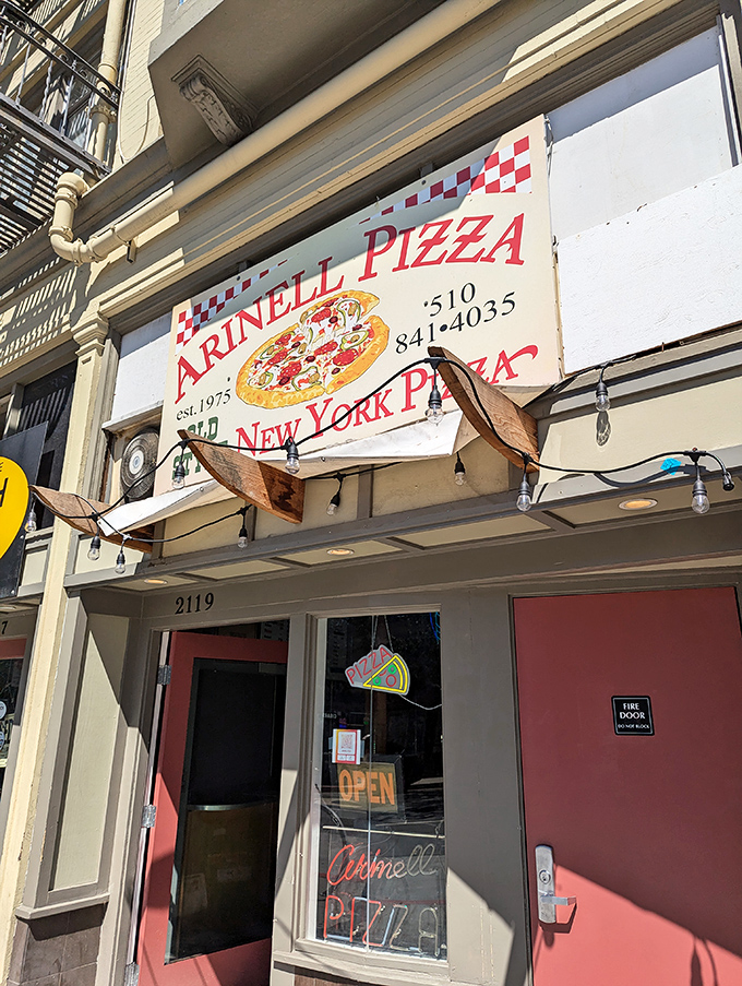 Arinell's vintage sign has been guiding Berkeley pizza pilgrims for decades. Simple, perfect New York slices await inside.