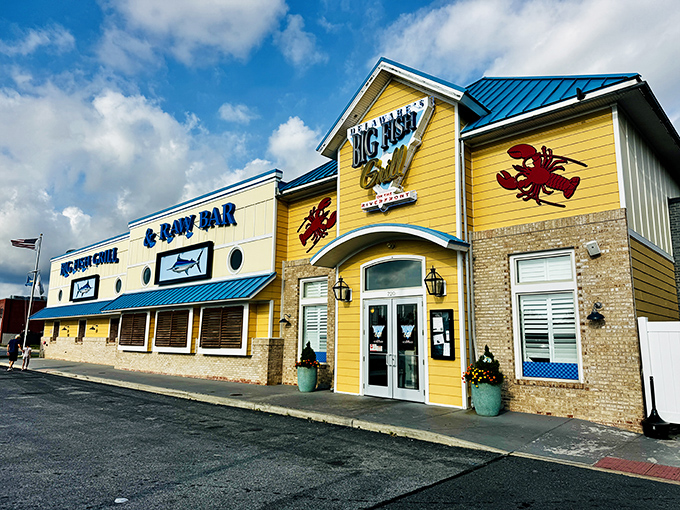 Big Fish Grill's yellow exterior radiates the kind of warmth that makes strangers feel like regulars.