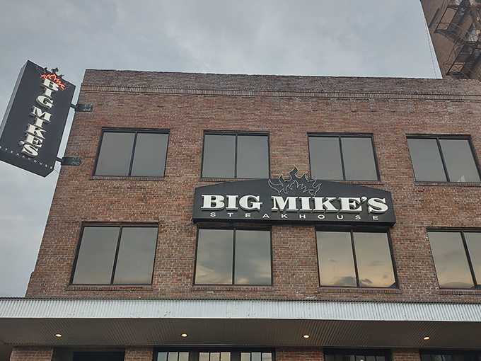 That brick facade means business - serious steakhouse vibes wrapped in downtown sophistication and hungry anticipation.