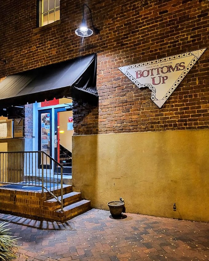 Bottoms Up's brick entrance and quirky sign feel like the secret password to Richmond's underground pizza society.