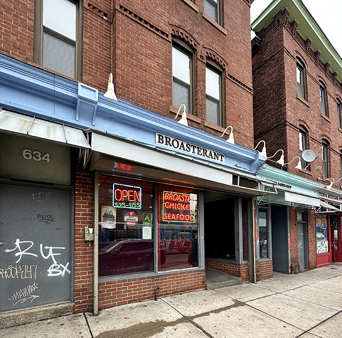 Broasterant's neon signs cut through Hartford's cityscape, a bat signal for those seeking pressure-fried chicken perfection.