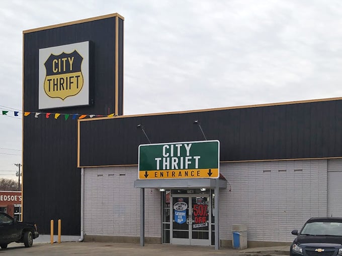 That dramatic black building stands out like a tuxedo at a barbecue - classy! 